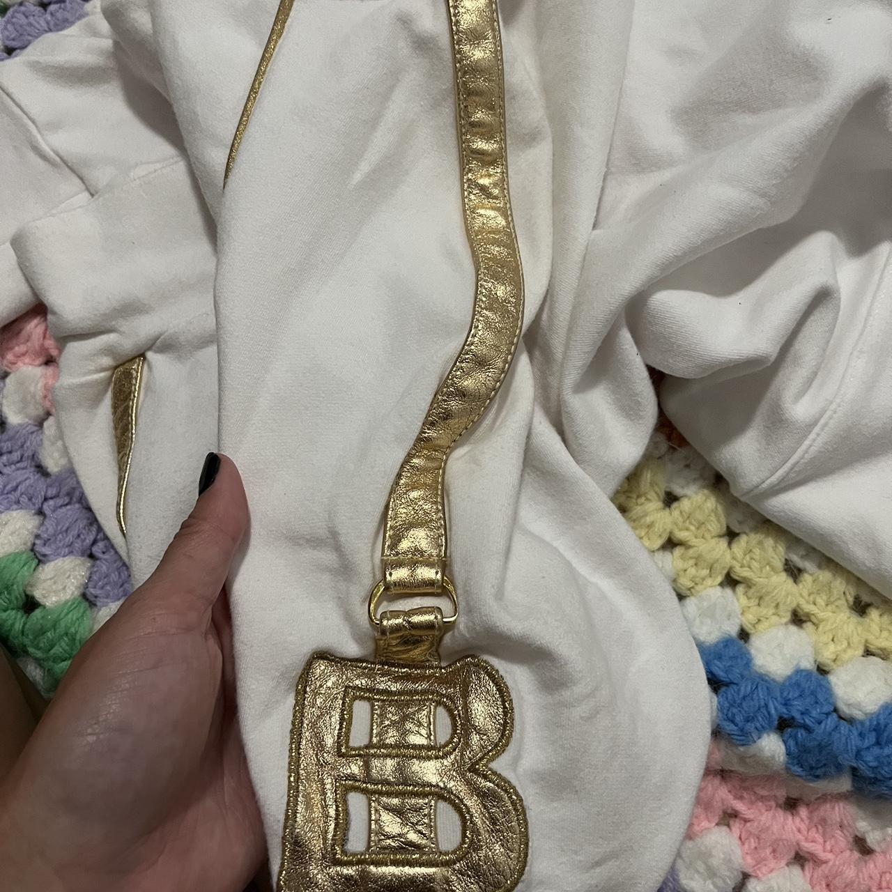 bebe sport white and gold zip up jacket size L last... - Depop