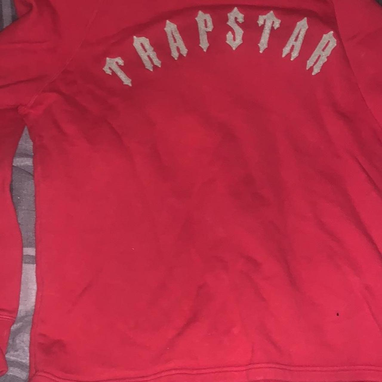 Red rare Trapstar jumper Size S would easily fit a M - Depop