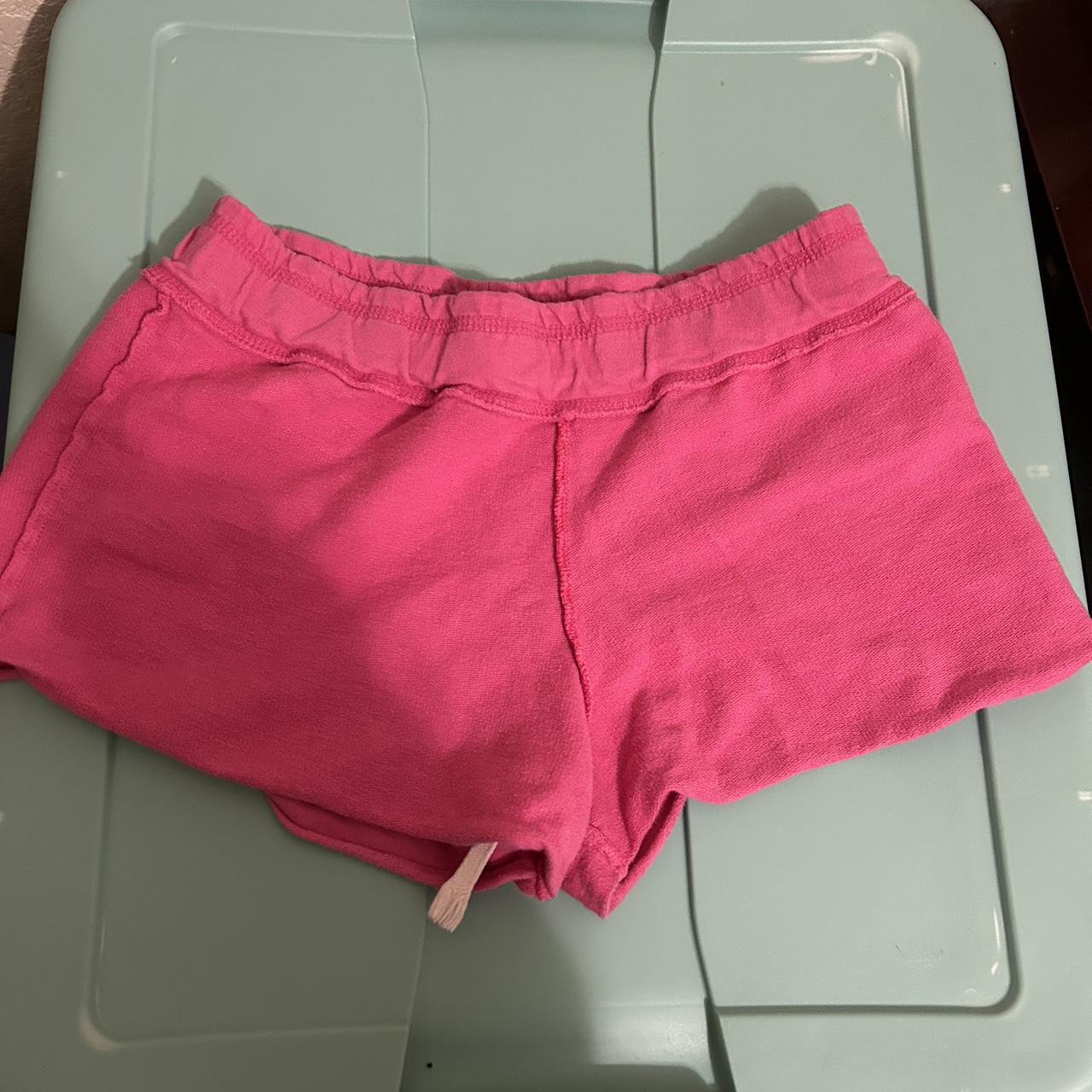PINK booty shorts Pinprick hole along right hip... - Depop