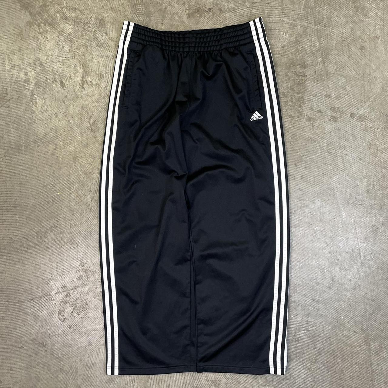 Adidas baggy tracksuit bottoms joggers black size... - Depop