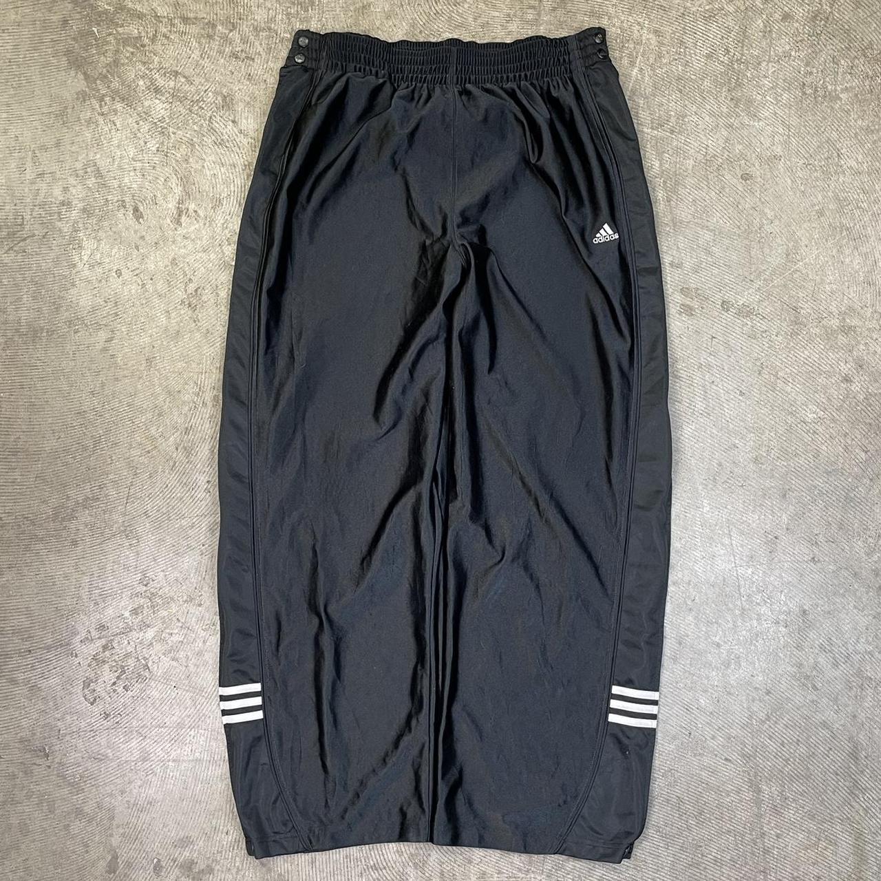 Adidas baggy tracksuit bottoms joggers black size... - Depop