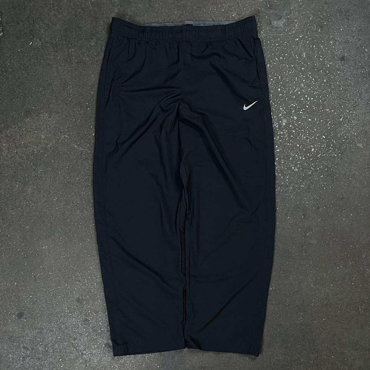 Vintage Nike baggy tracksuit pants black baggy... - Depop