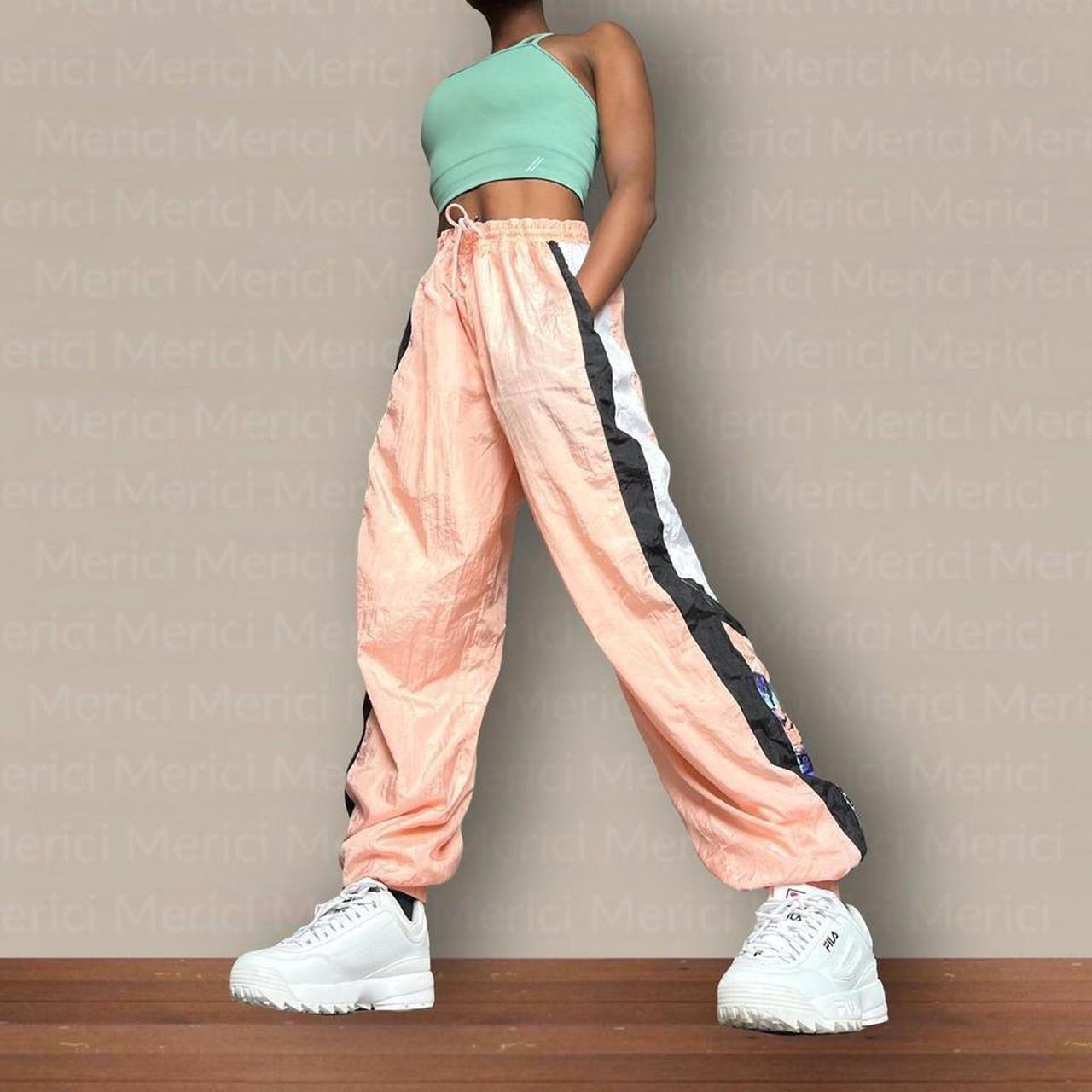 90s track pants Best fits small/medium • peach •... - Depop