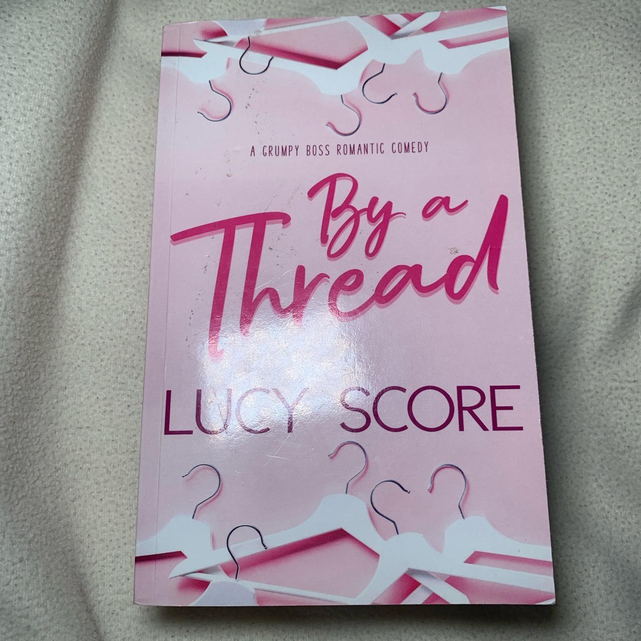 By a Thread by Lucy Score Paperback copy • read... - Depop