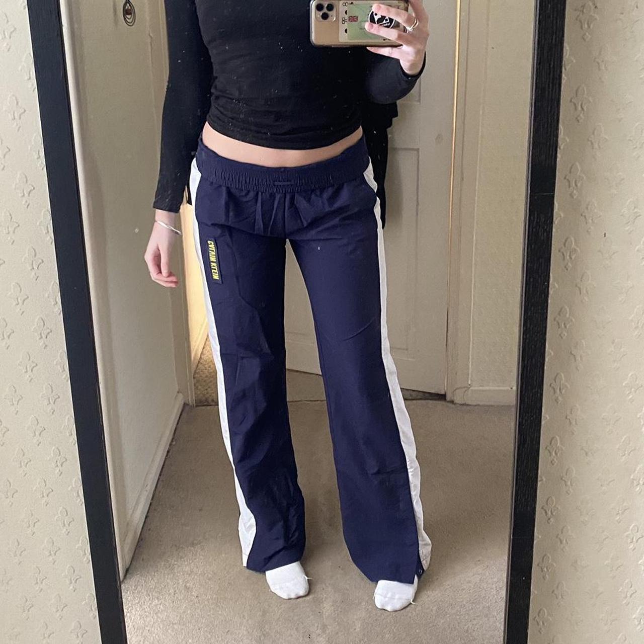 Calvin Klein trackies have buttons at bottom of leg... - Depop