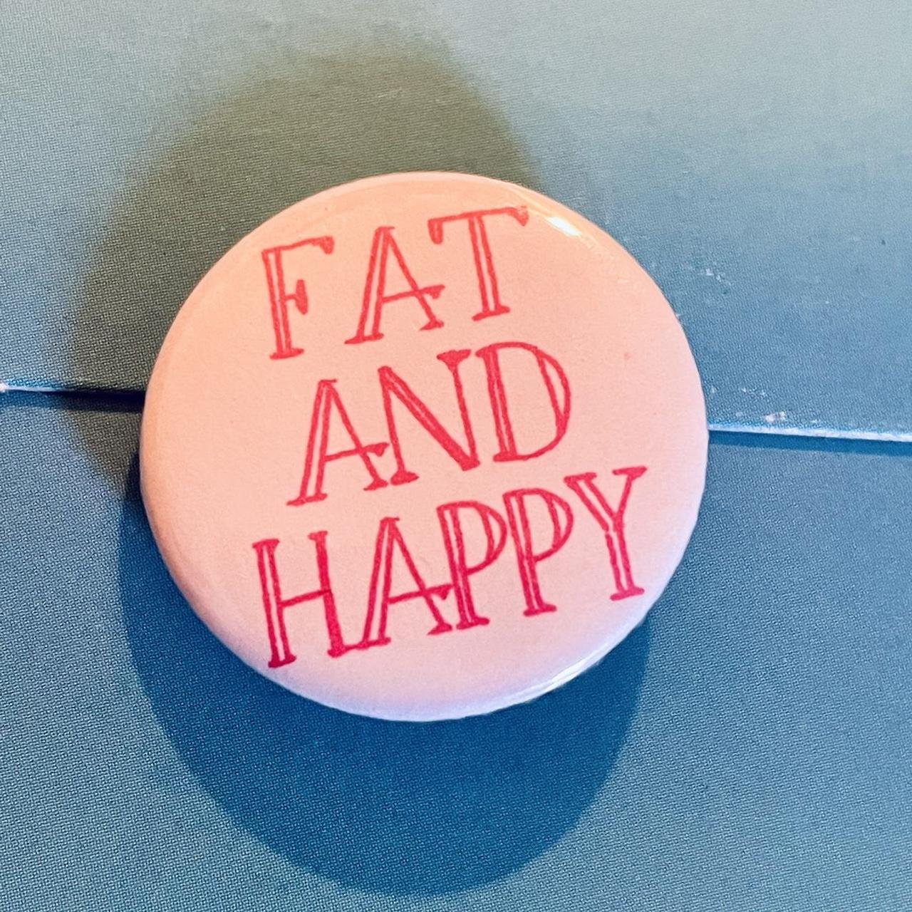 1” pin badge, slogan “FAT AND HAPPY”. Pink text on... | Depop