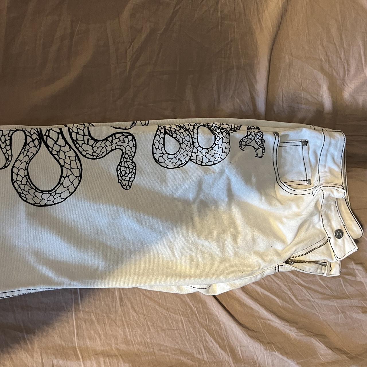 White Low rise snake pants Snakes on both side on... - Depop