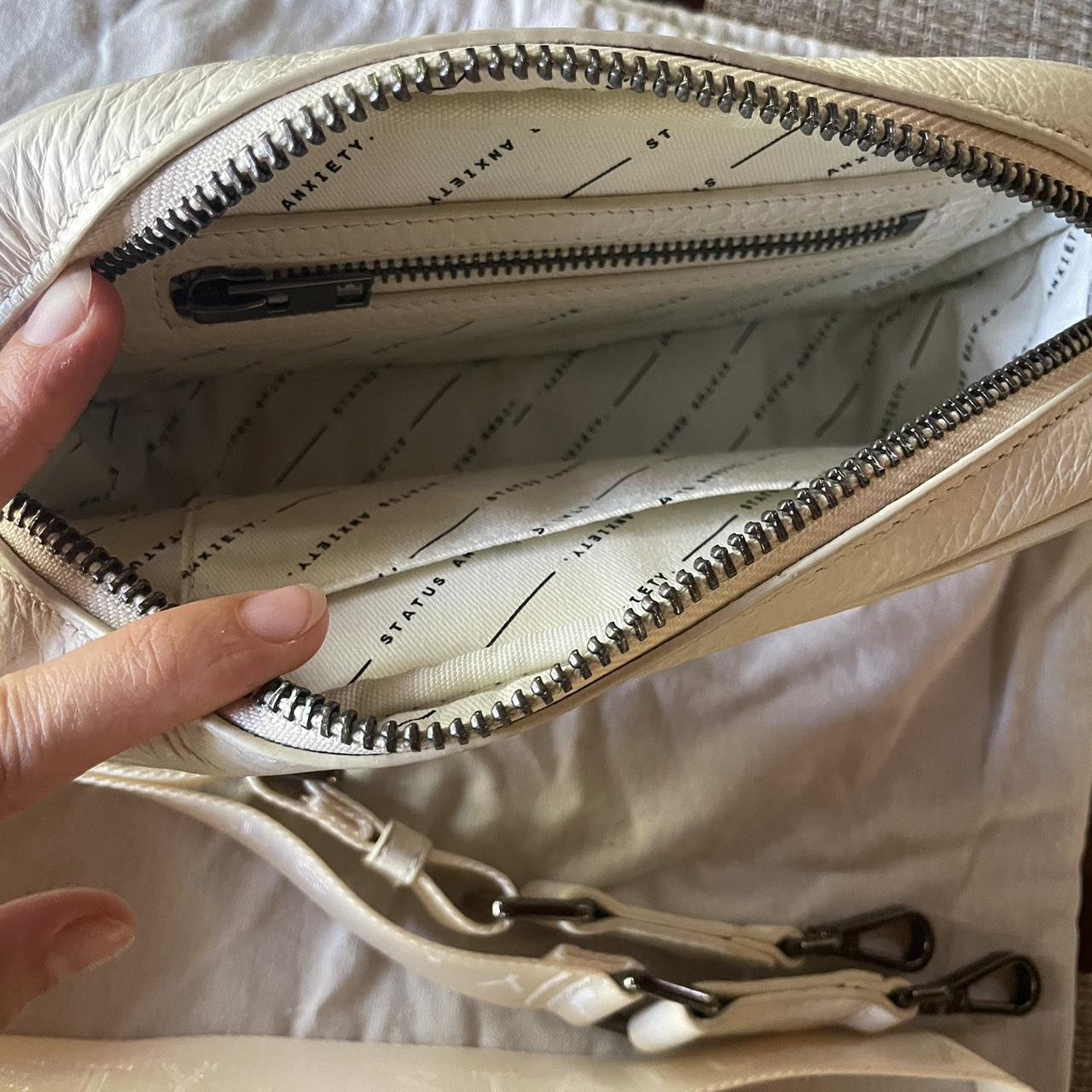 Status Anxiety cream cross body bag. Basically... - Depop