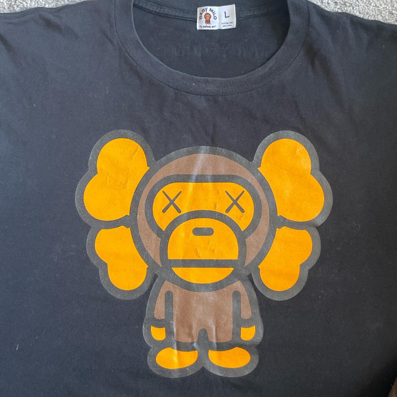 BAPE X KAWS T SHIRT VINTAGE BABY MILO X KAWS T... - Depop