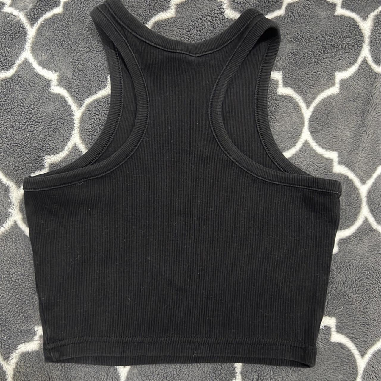 Black ribbed crop top. It looks linty in the picture... | Depop