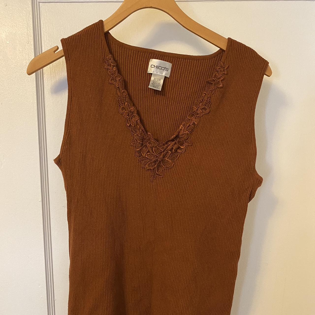 orange ribbed tank top with lace detailing and a V... - Depop