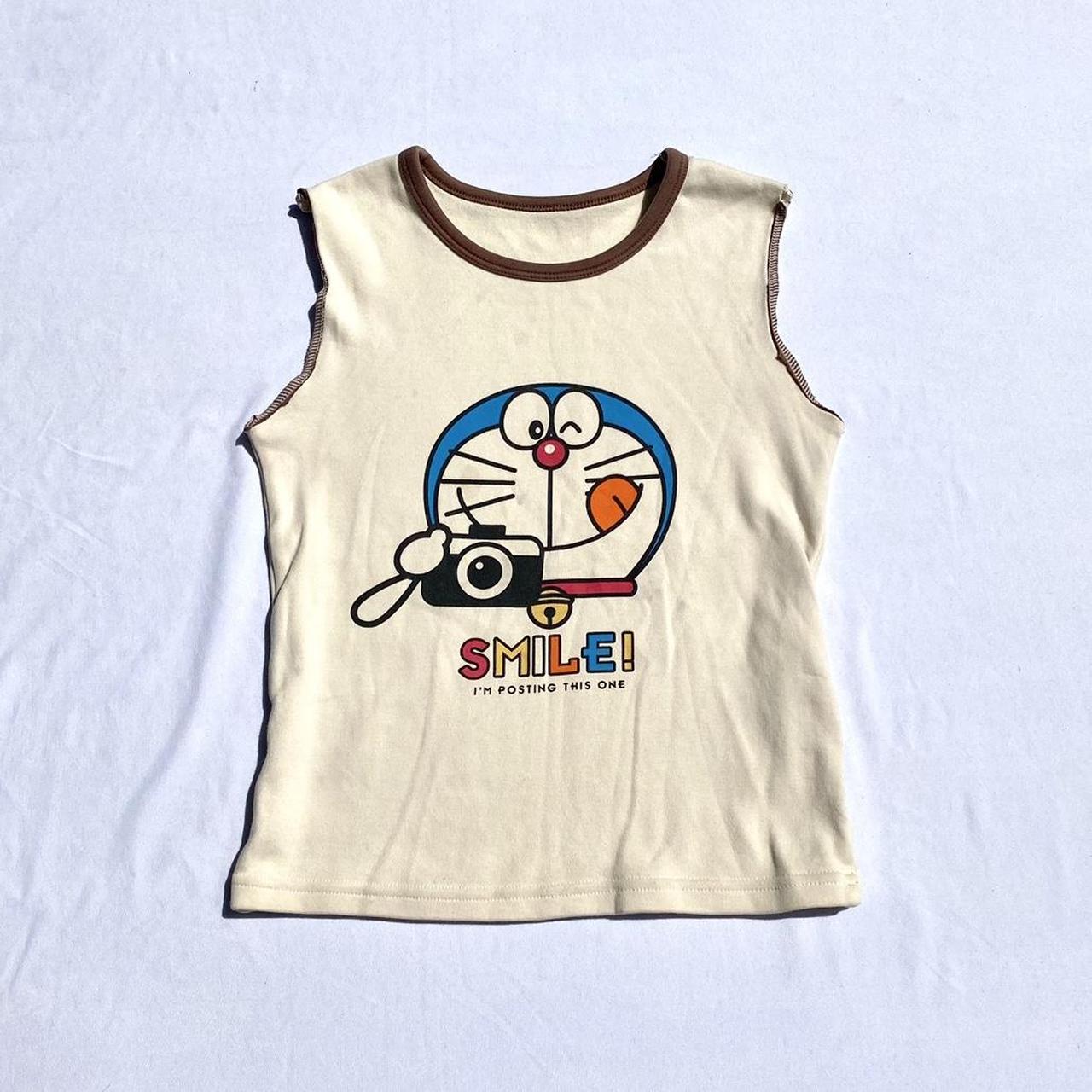 Vintage rare Doraemon cream cropped muscle baby tank... - Depop