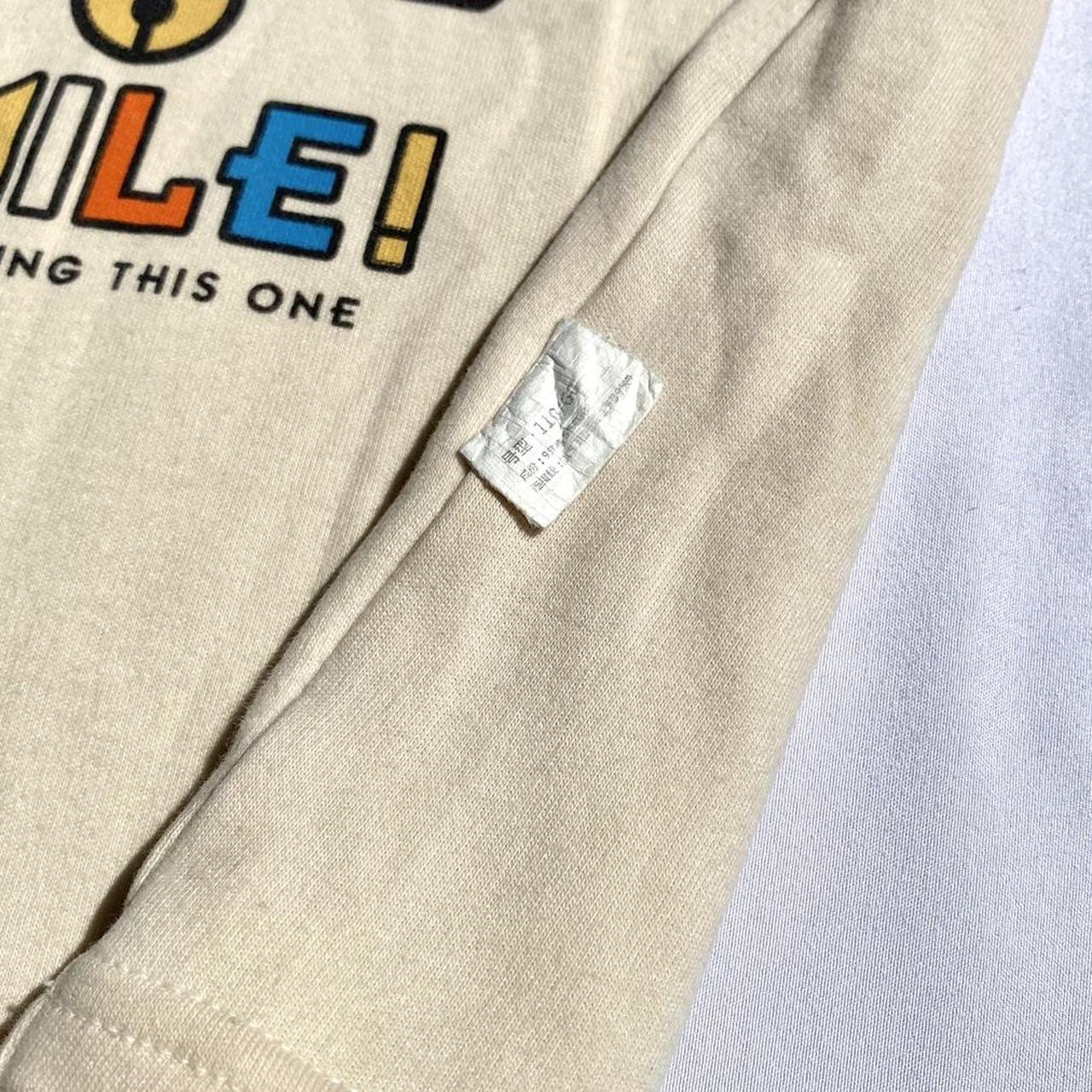 Vintage rare Doraemon cream cropped muscle baby tank... - Depop