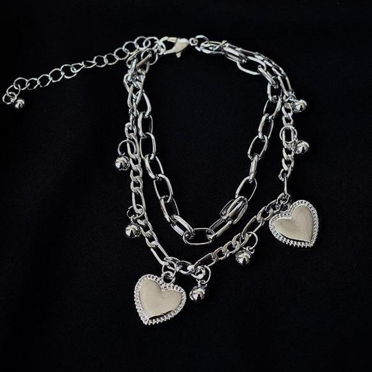 Y2k Silver (not 925 silver) double chain hearts... - Depop