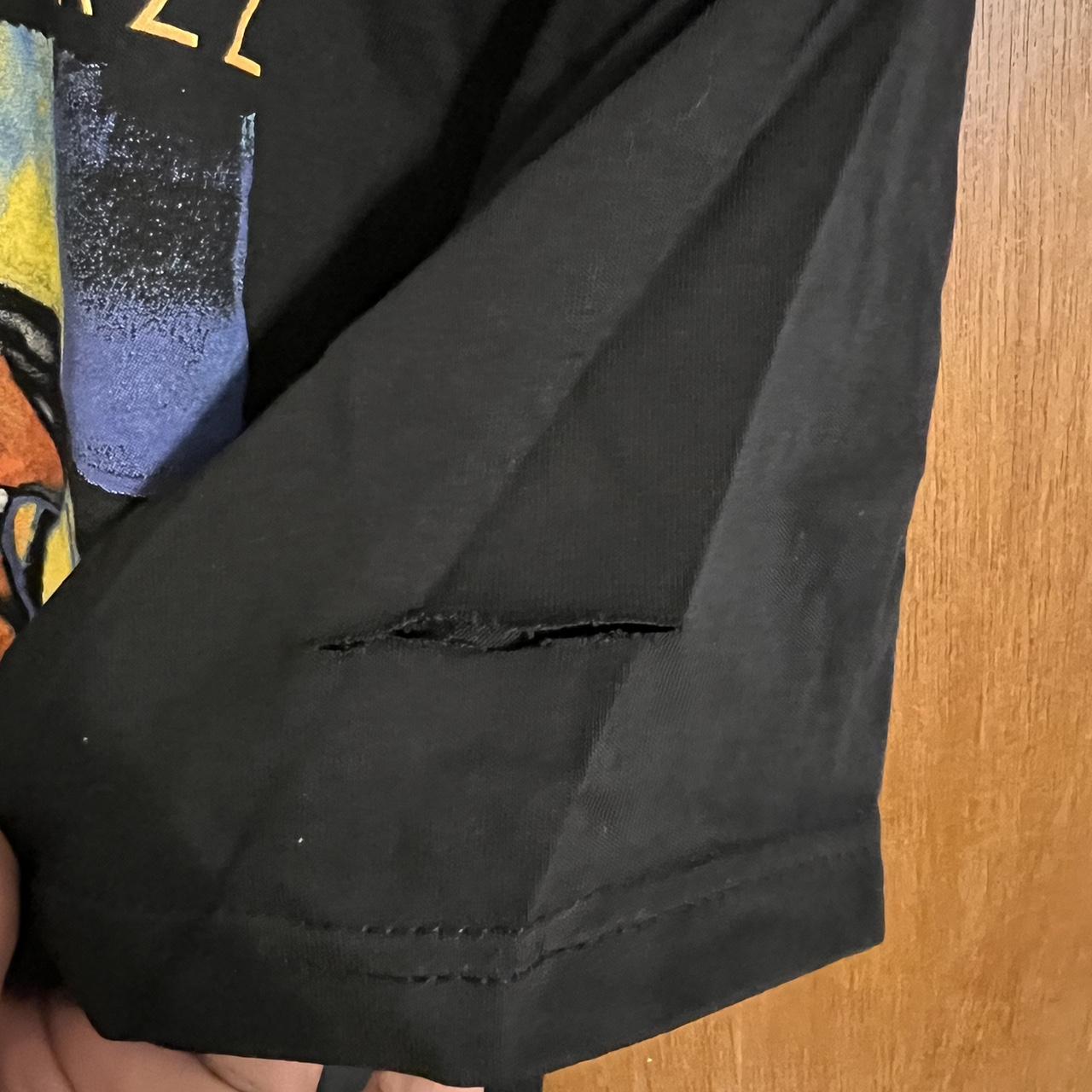 new orleans jazz t shirt rip on sleeve... - Depop