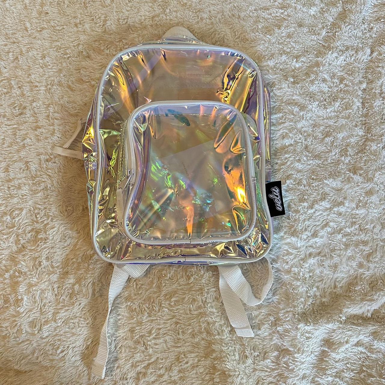 Brand new small white holographic backpack with two... - Depop