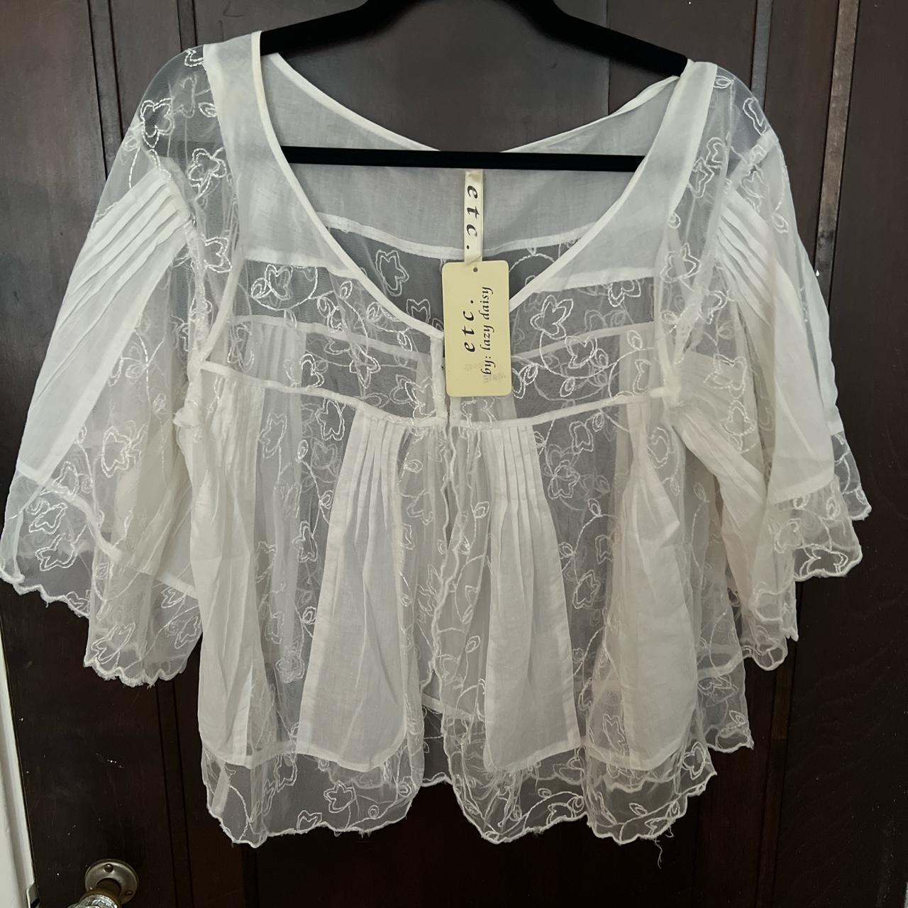 Lacy dainty top with 3 eyelet closures at chest.... - Depop