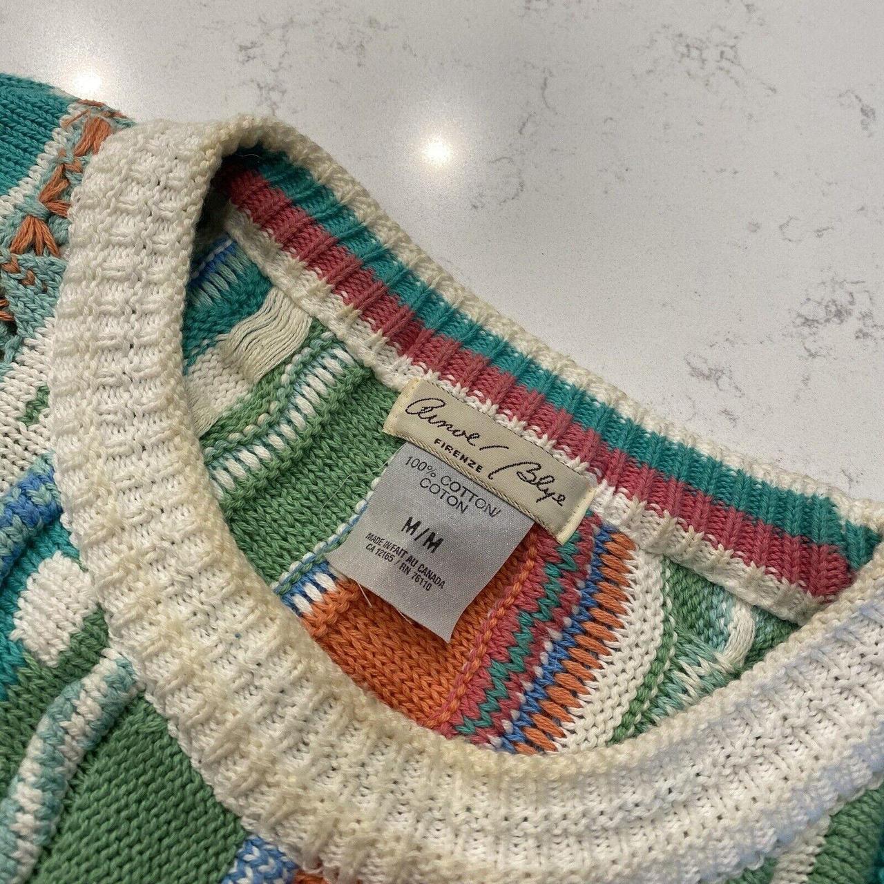 This colorful Coogi-style sweater features a... - Depop