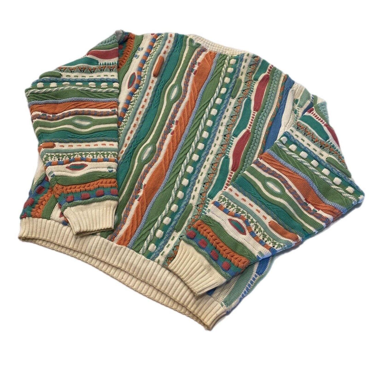 This colorful Coogi-style sweater features a... - Depop