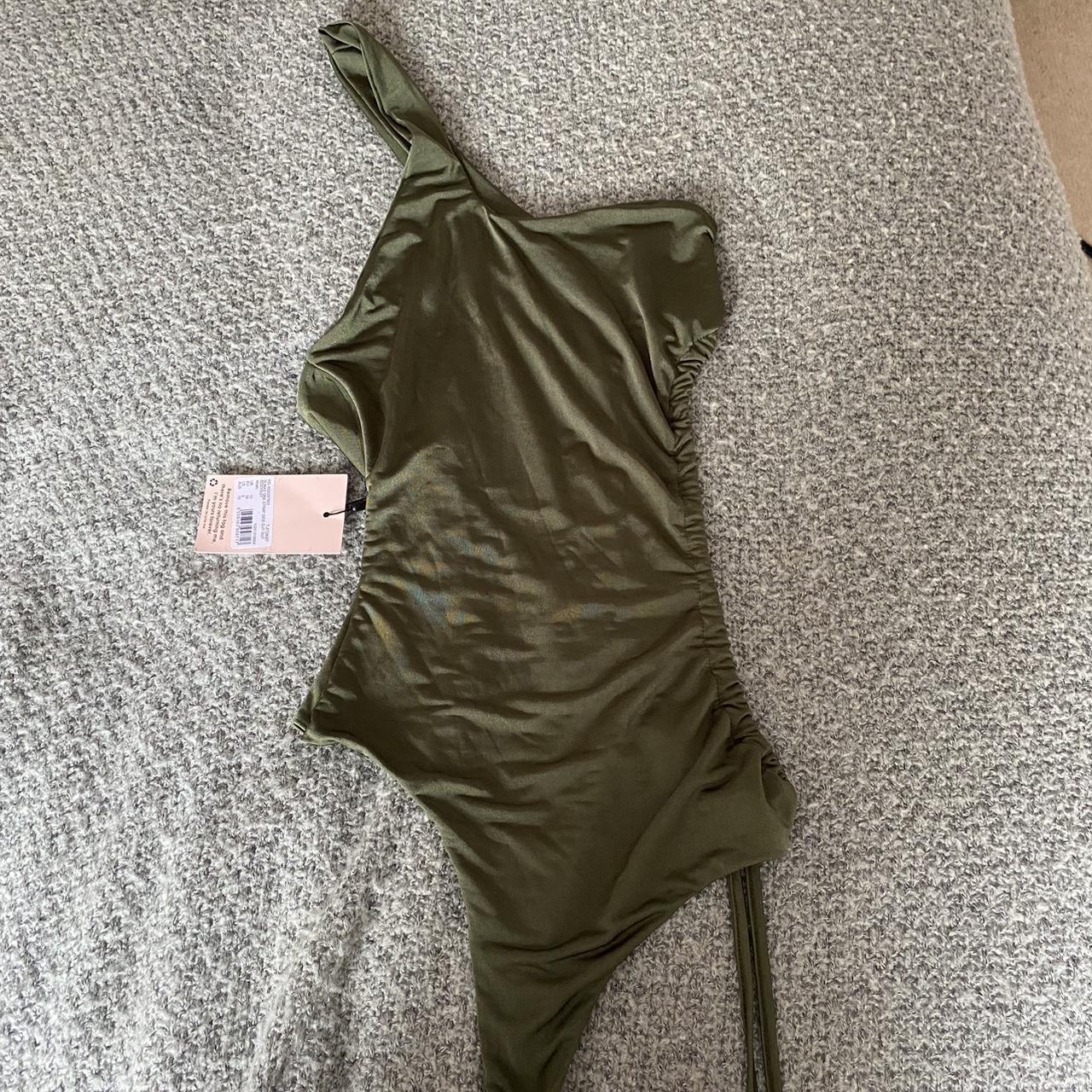 Missguided khaki body suit Cut out on the side... - Depop