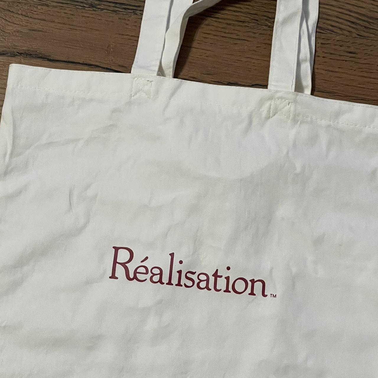 realisation par tote love that this has a short and... - Depop