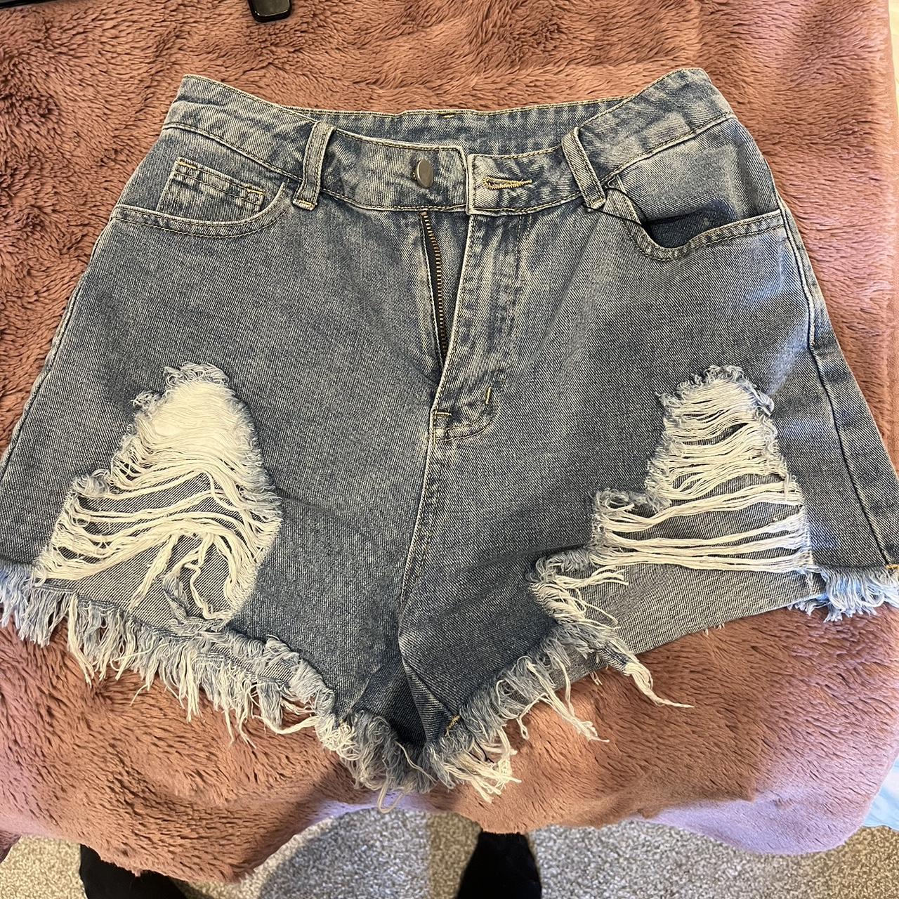 Blue denim ripped shorts W26 im 6/8 and they fit me... - Depop