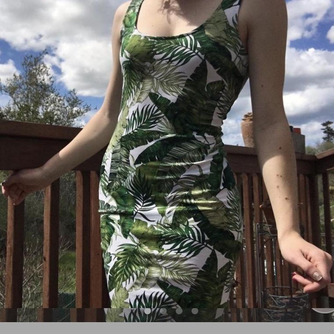 Bodycon tropical plant dress Fits a small but will... - Depop
