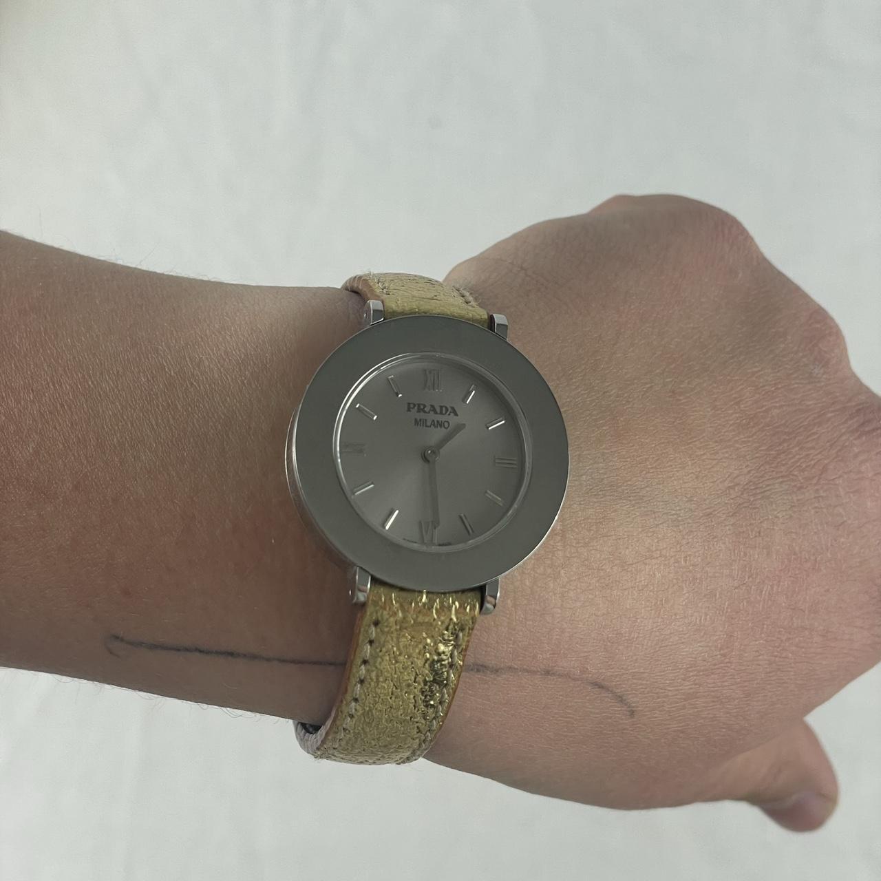Prada Women's Gold and Silver Watch | Depop