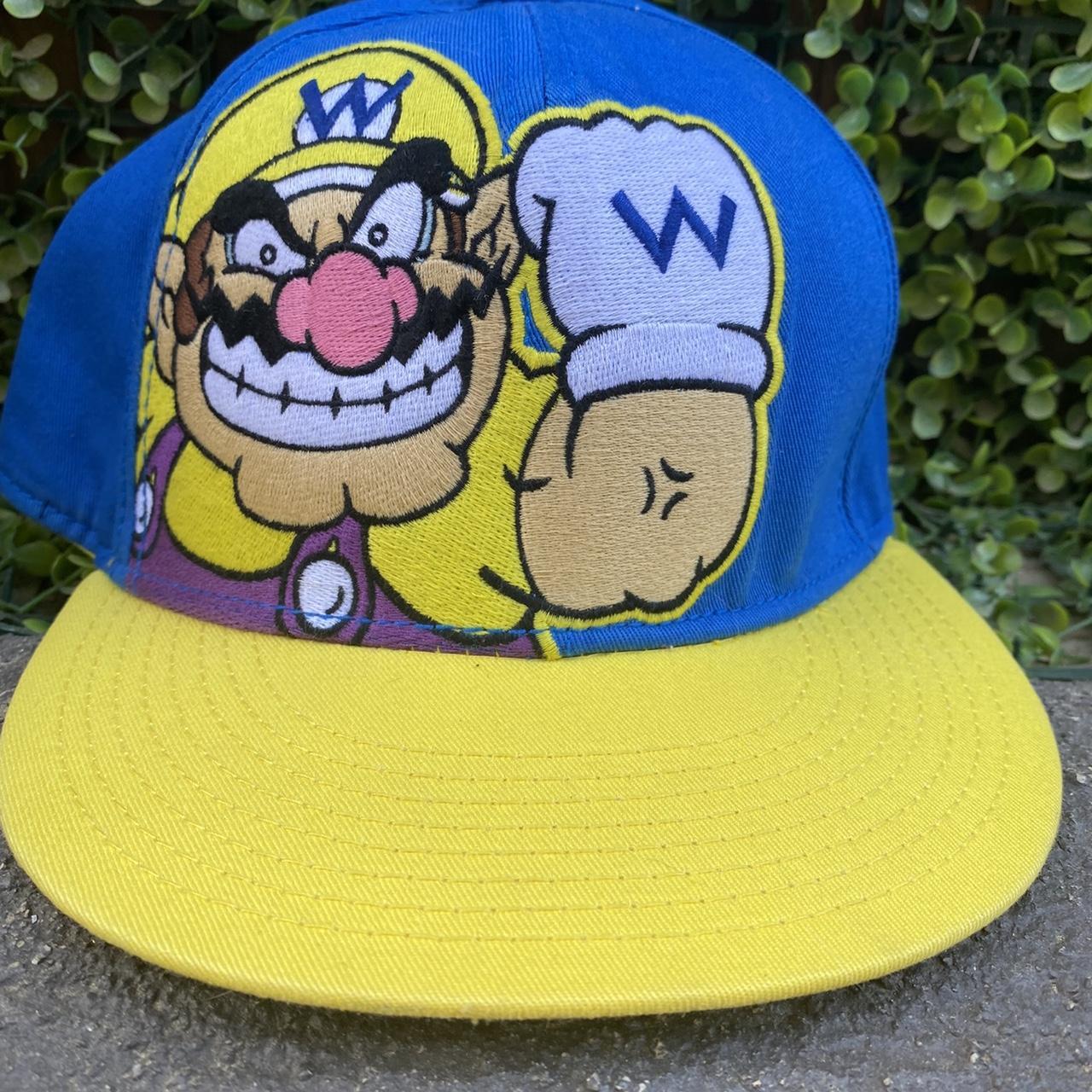 Sick wario hat from 2011 . Blue and yellow .... - Depop