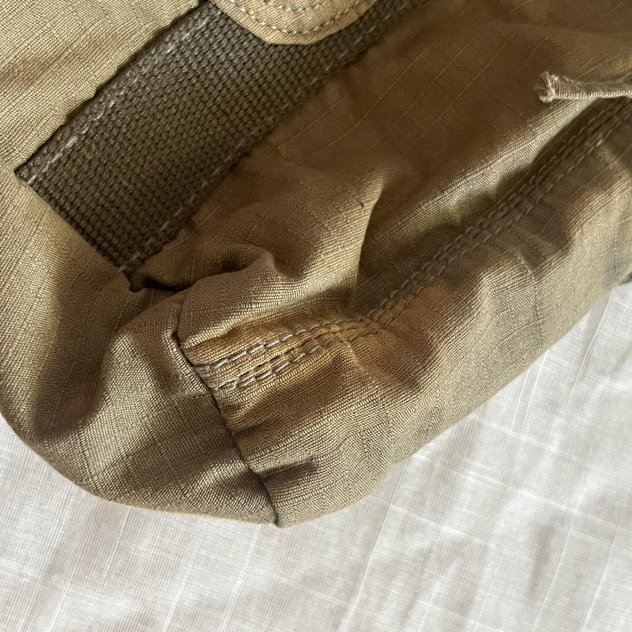 Super cute, small khaki tote style bag with pockets... - Depop