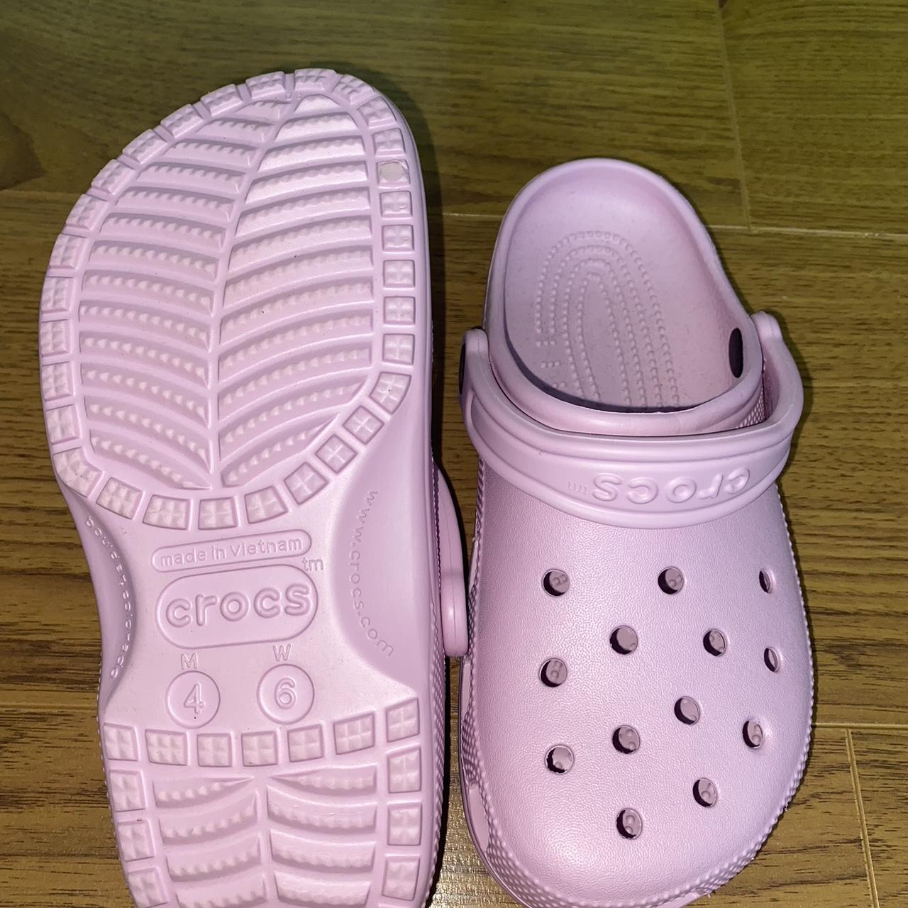 Crocs Women's Pink Flipflops | Depop
