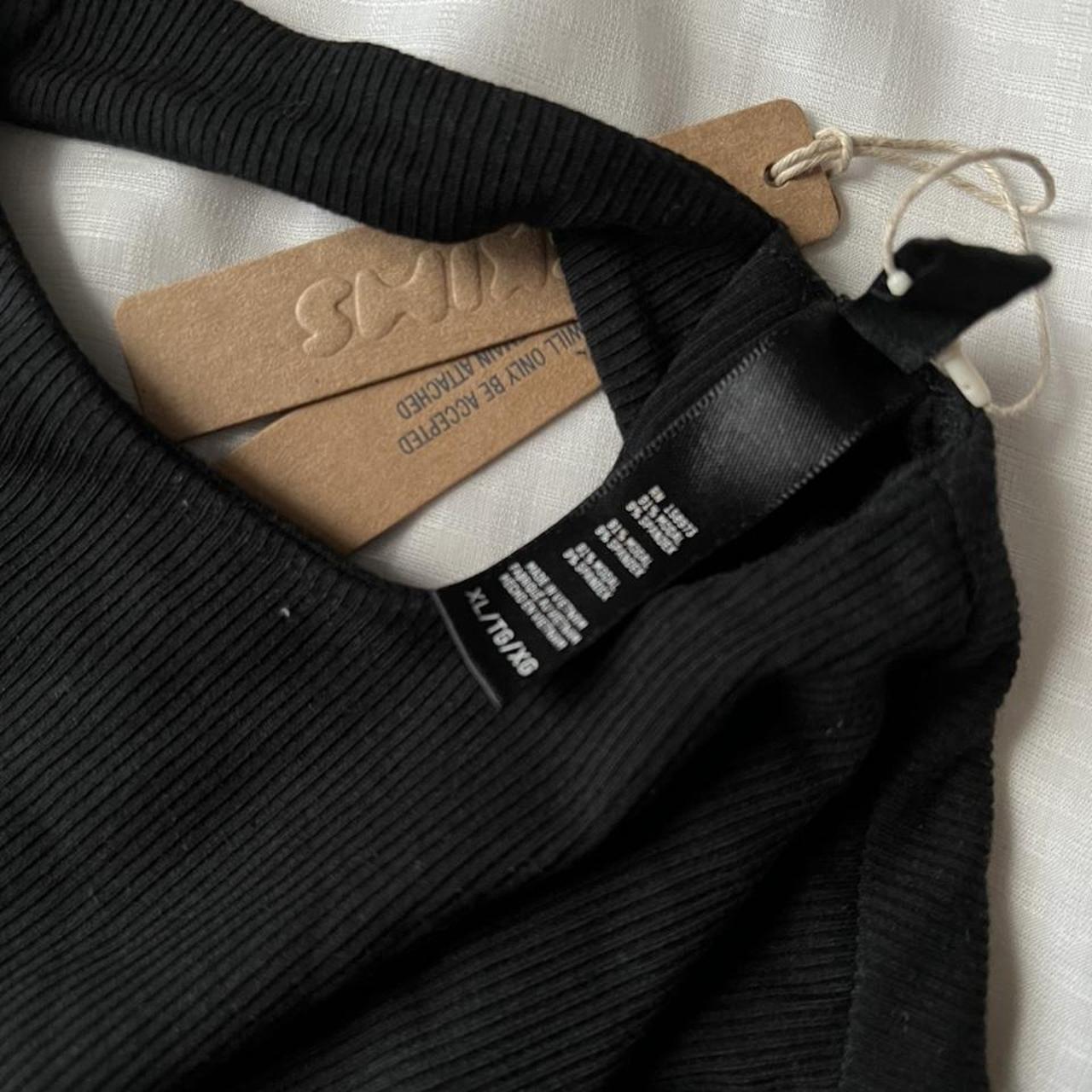 Skims Women's Black Crop-top | Depop