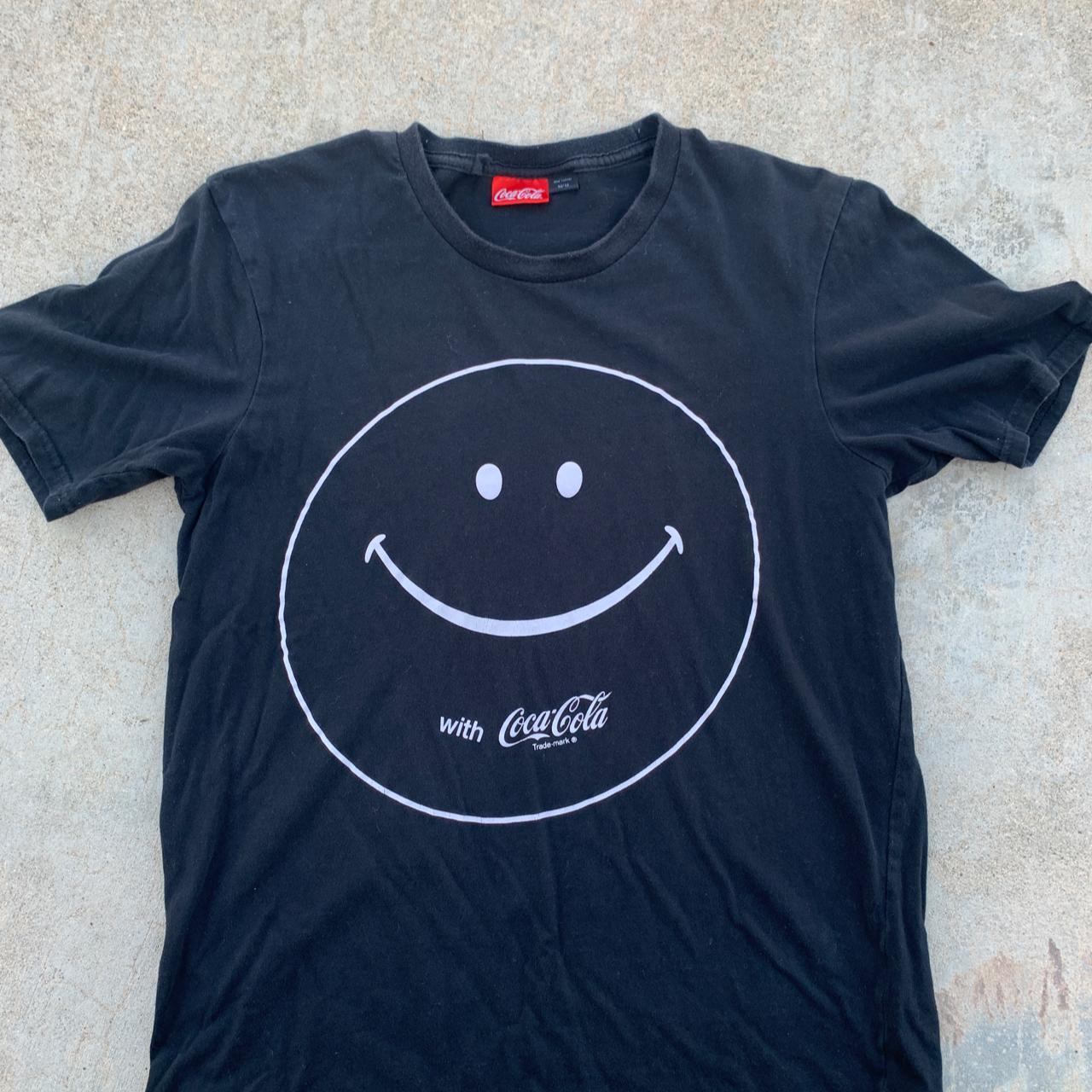 Coca Cola Smiley Black Tee Size M Black fade in... - Depop