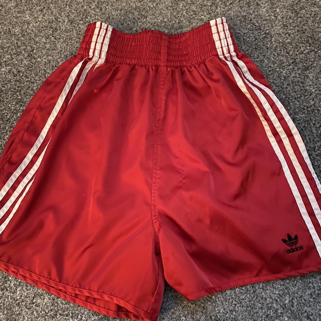 Silky red adidas boxing shorts with graphic writing... - Depop
