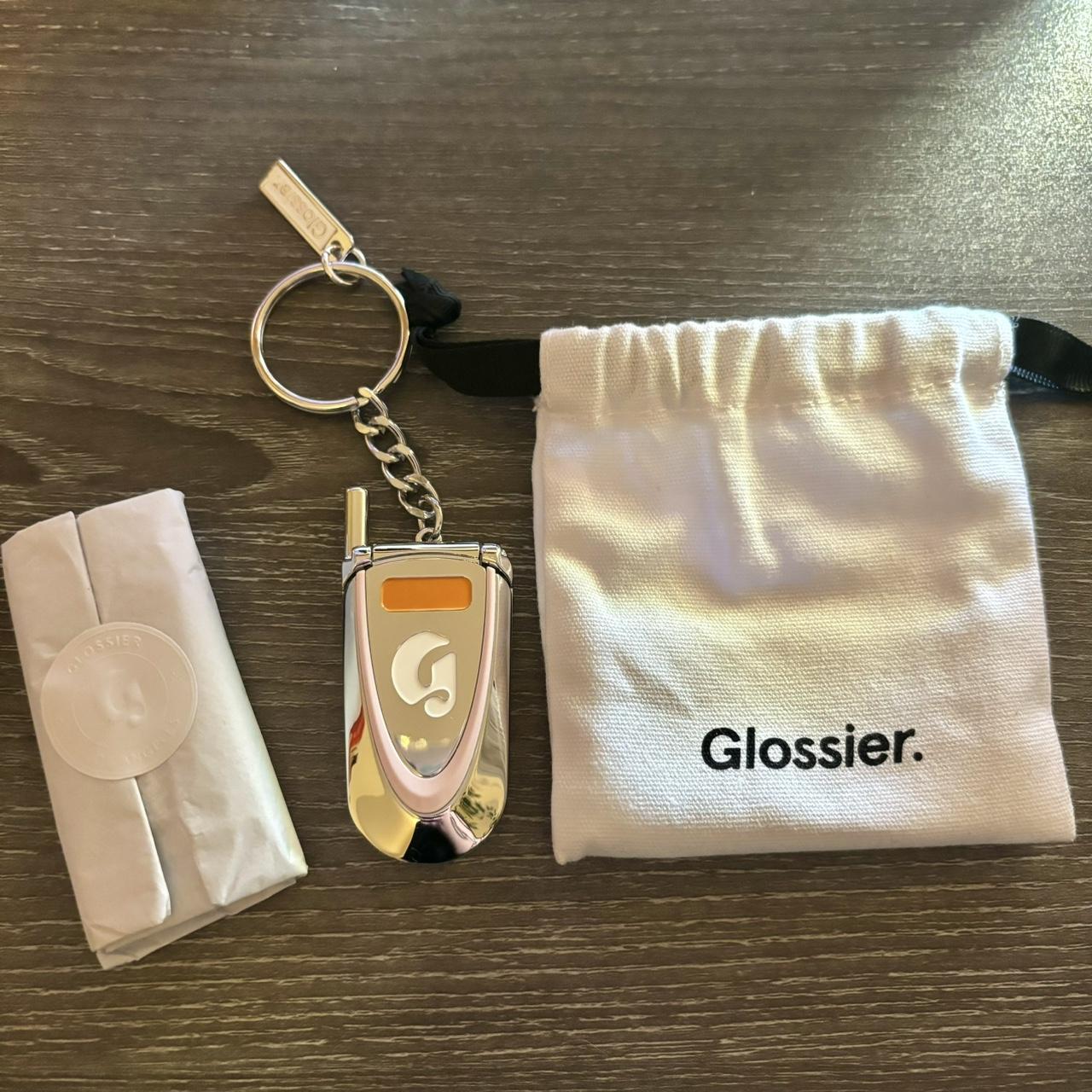 glossier LA exclusive flip phone keychain! very high... - Depop