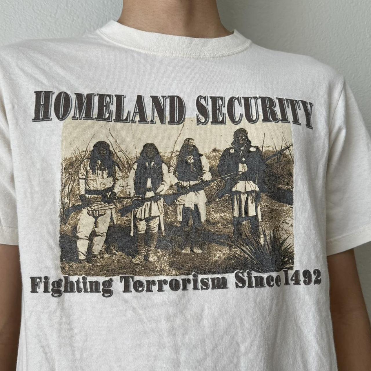 Vintage Homeland Security 2000s Graphics White Tee... | Depop