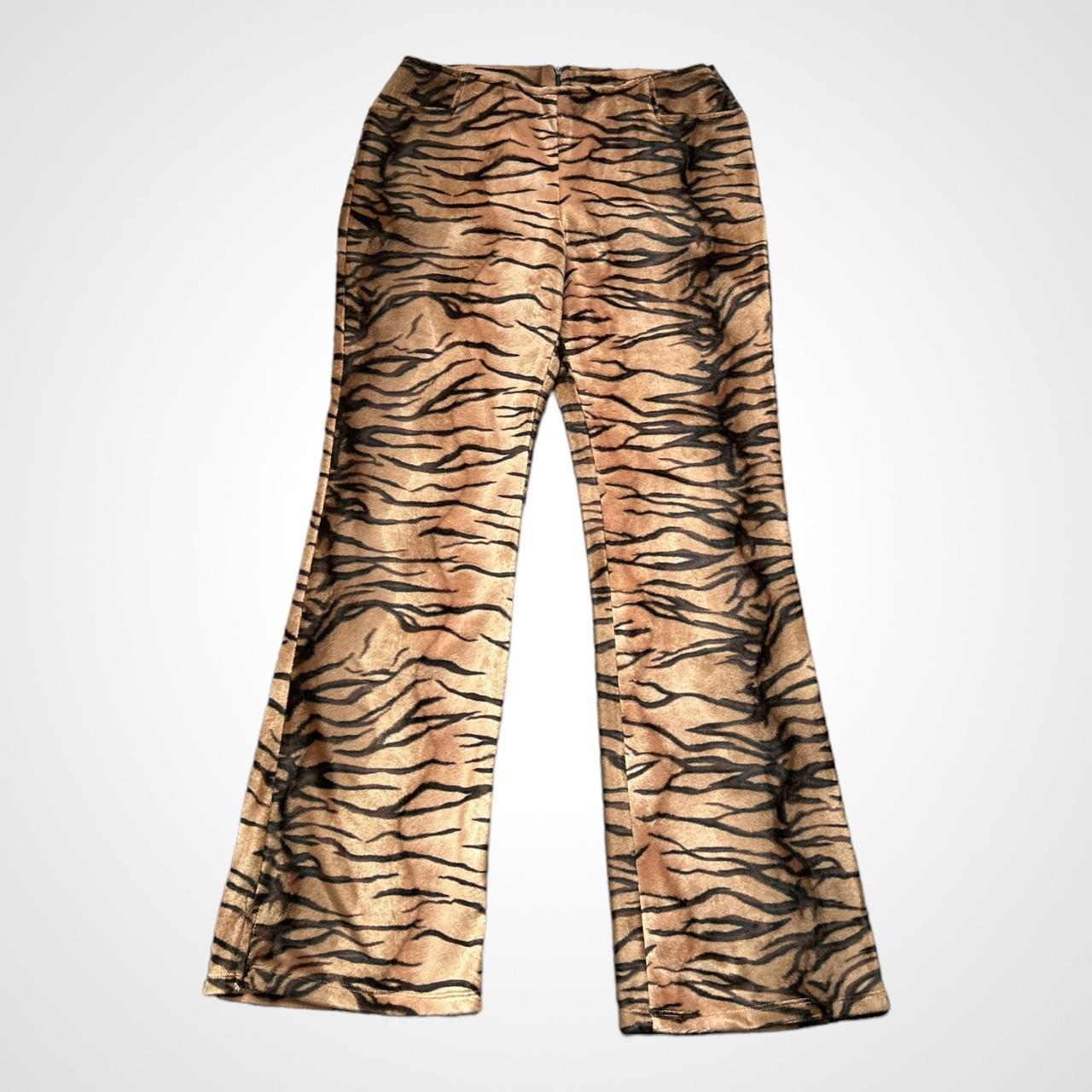 90s vintage low rise flares, tiger stripe animal... - Depop