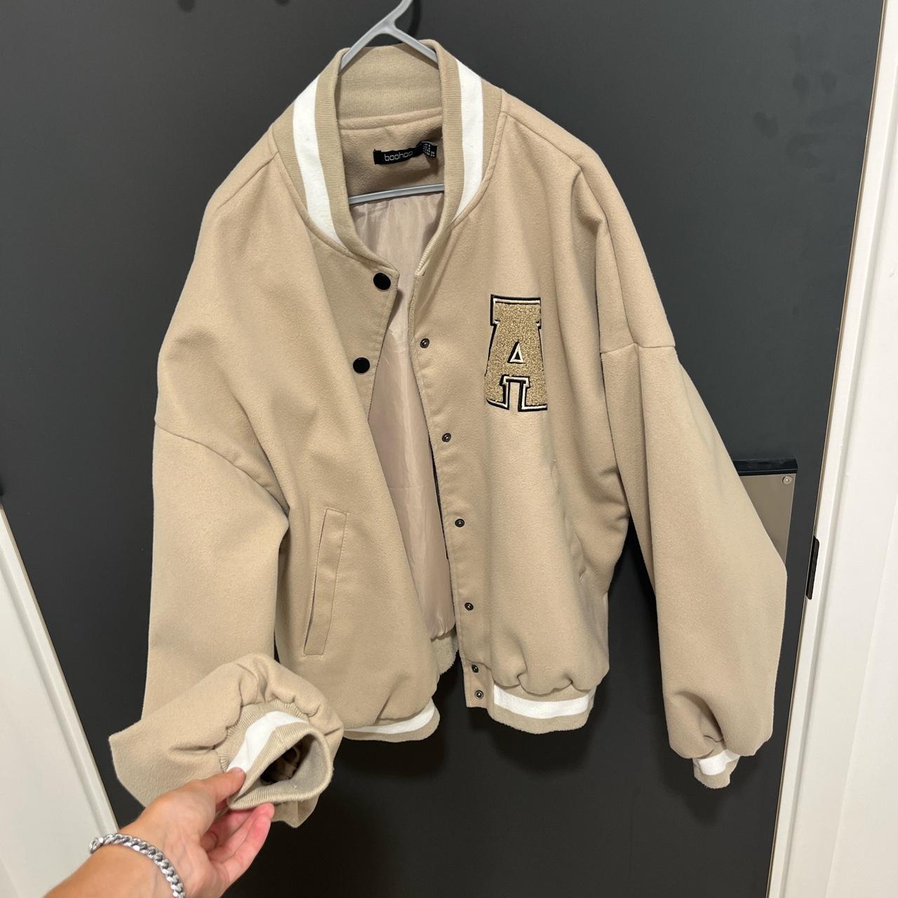 Beige varsity jacket. Excellent condition. Size 8 - Depop