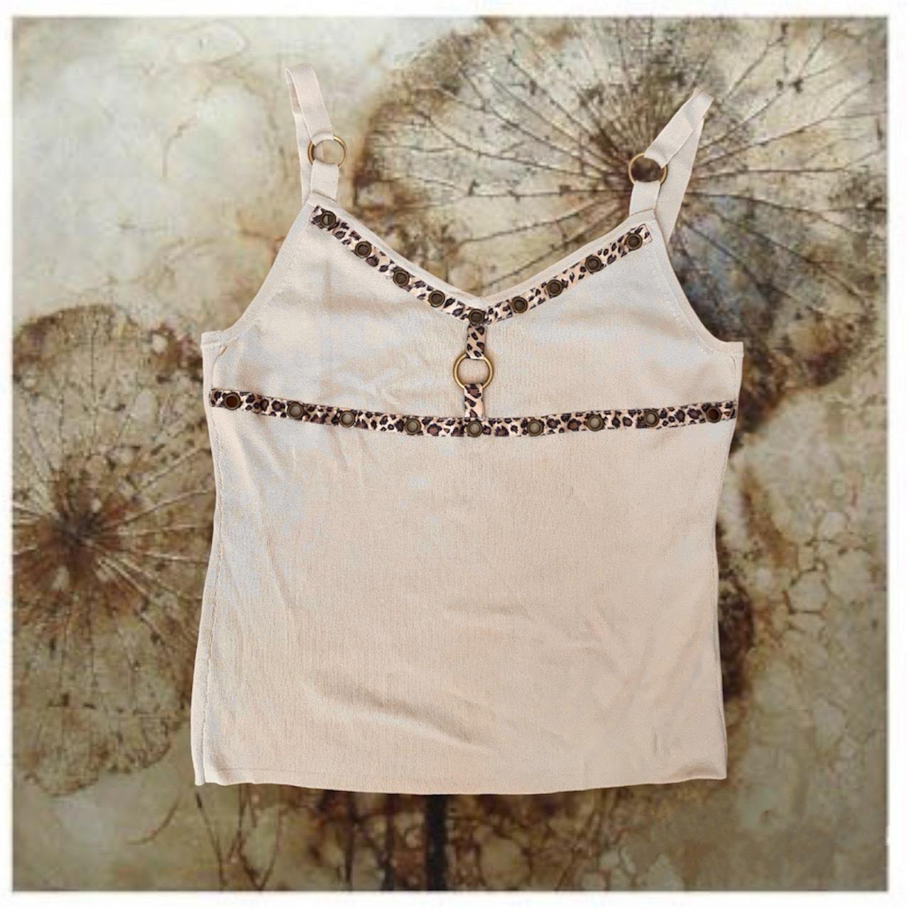 The cutest y2k cream bronze hardware singlet top... - Depop