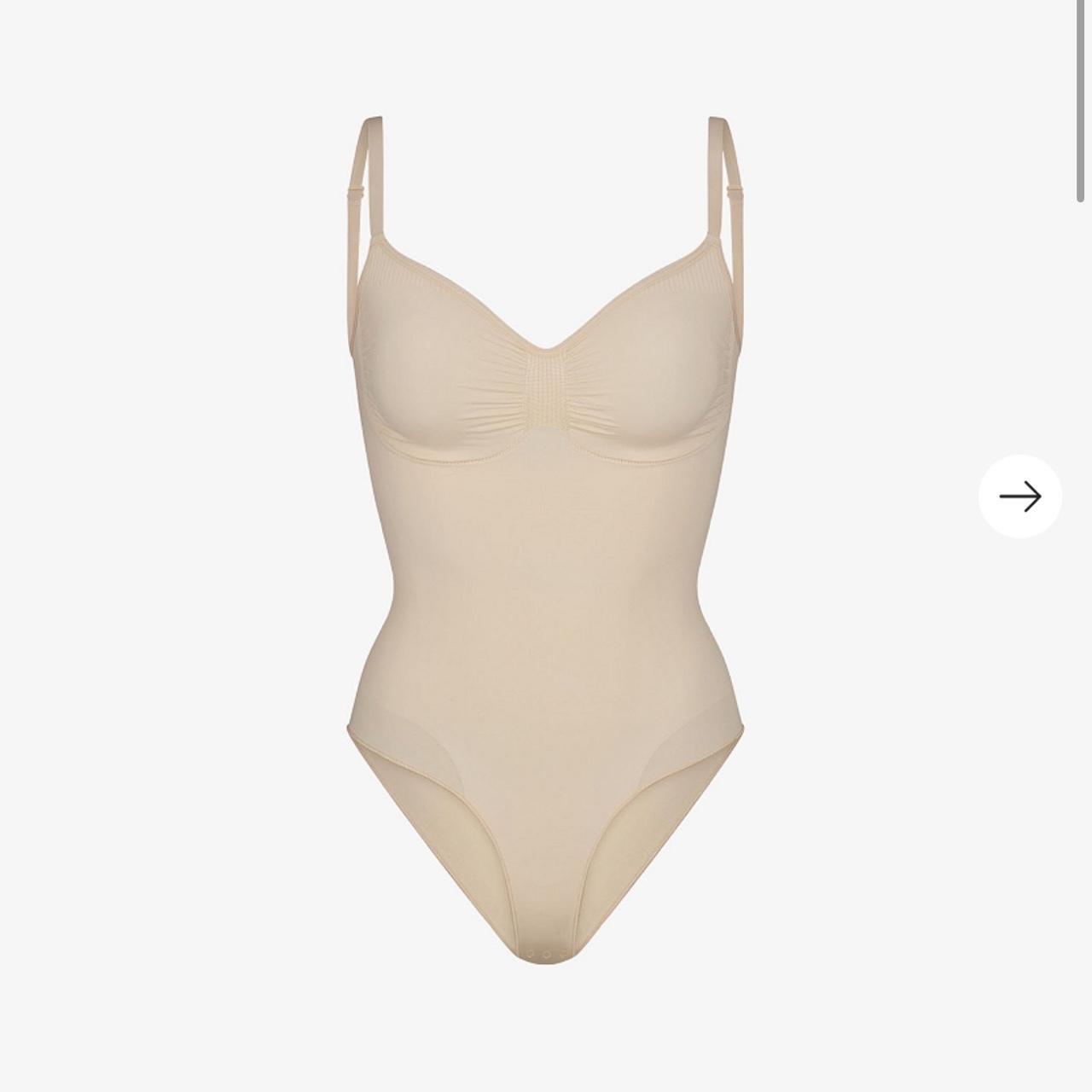 SKIMS sand thong sculpt ruched stretch-woven body -... - Depop