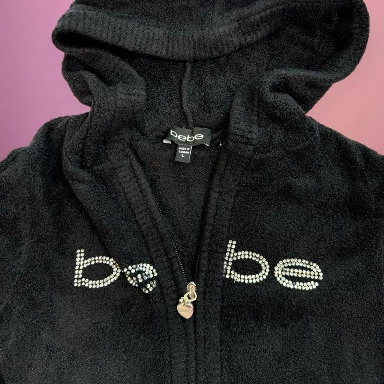 The iconic BeBe Y2K 2000s vintage hooded black zip... - Depop