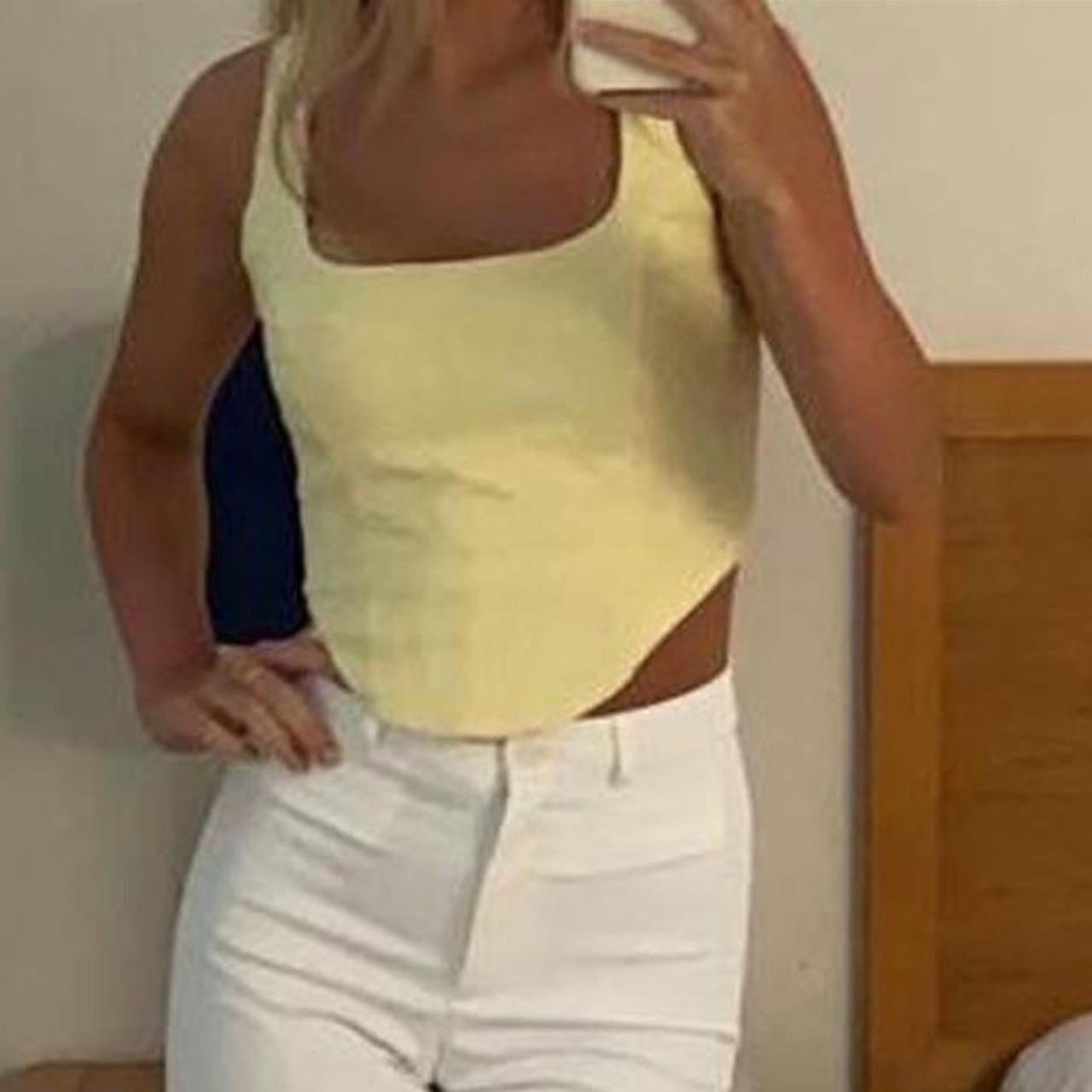 Pastel yellow corset top size 6 Worn a couple times... - Depop