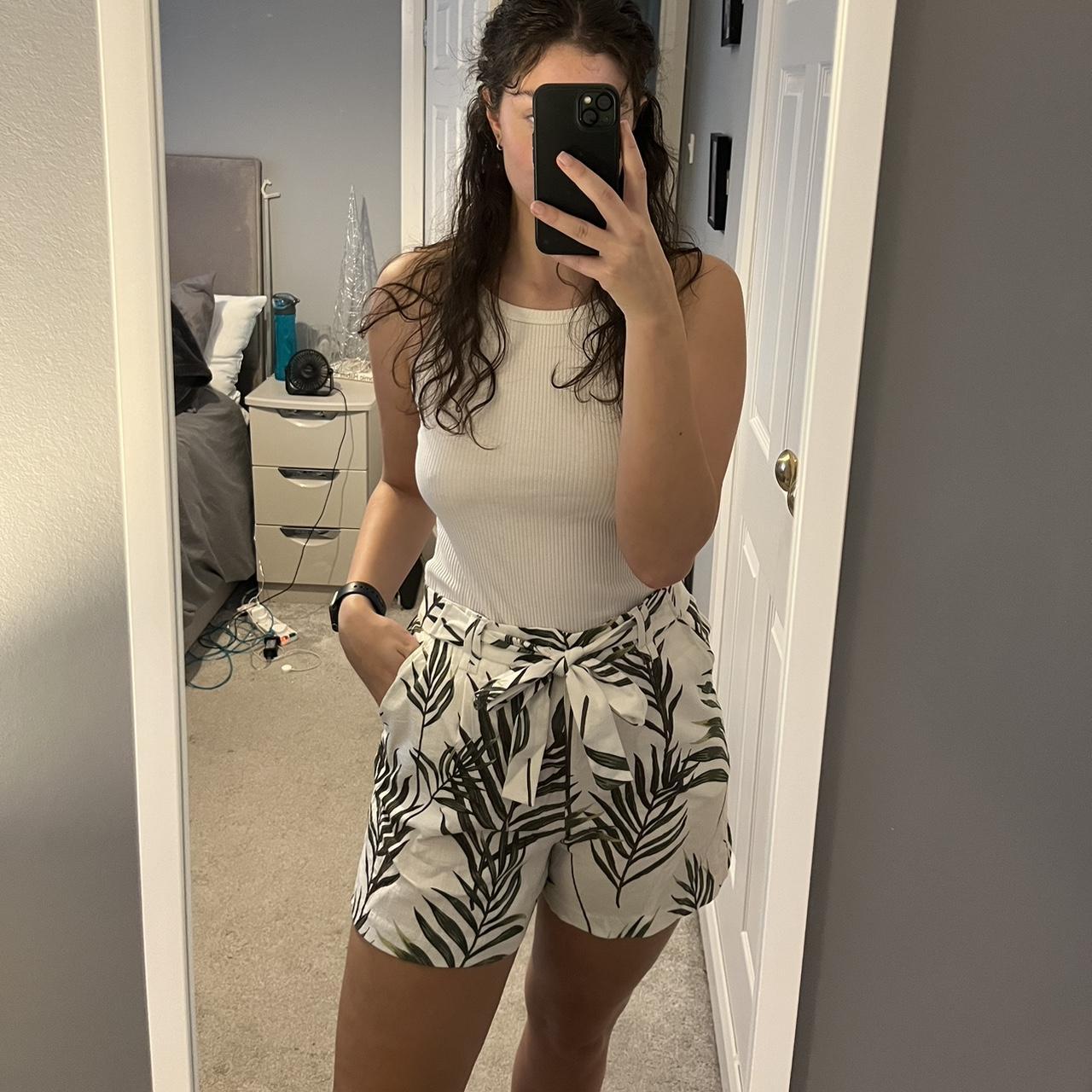 Green and white floaty shorts with tie and... - Depop