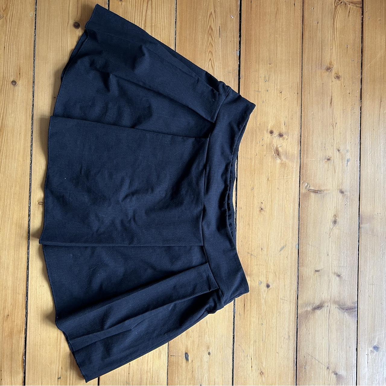 Black pleated mini-skort. Crepey material. Never... - Depop