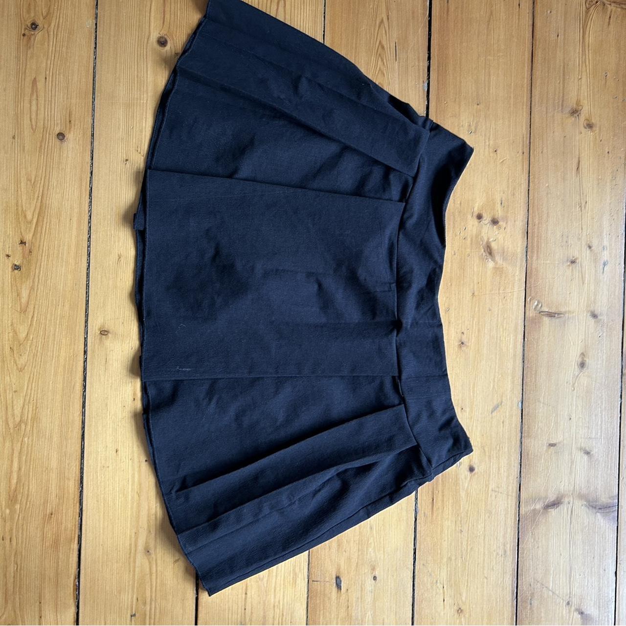 Black pleated mini-skort. Crepey material. Never... - Depop
