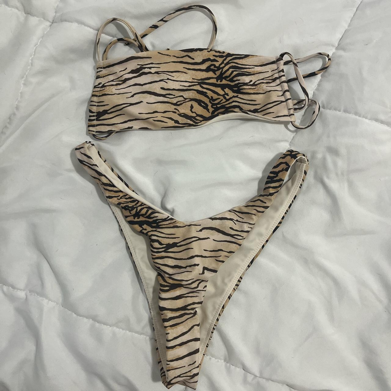 Revolve Tiger print bikini top is size small but top... - Depop