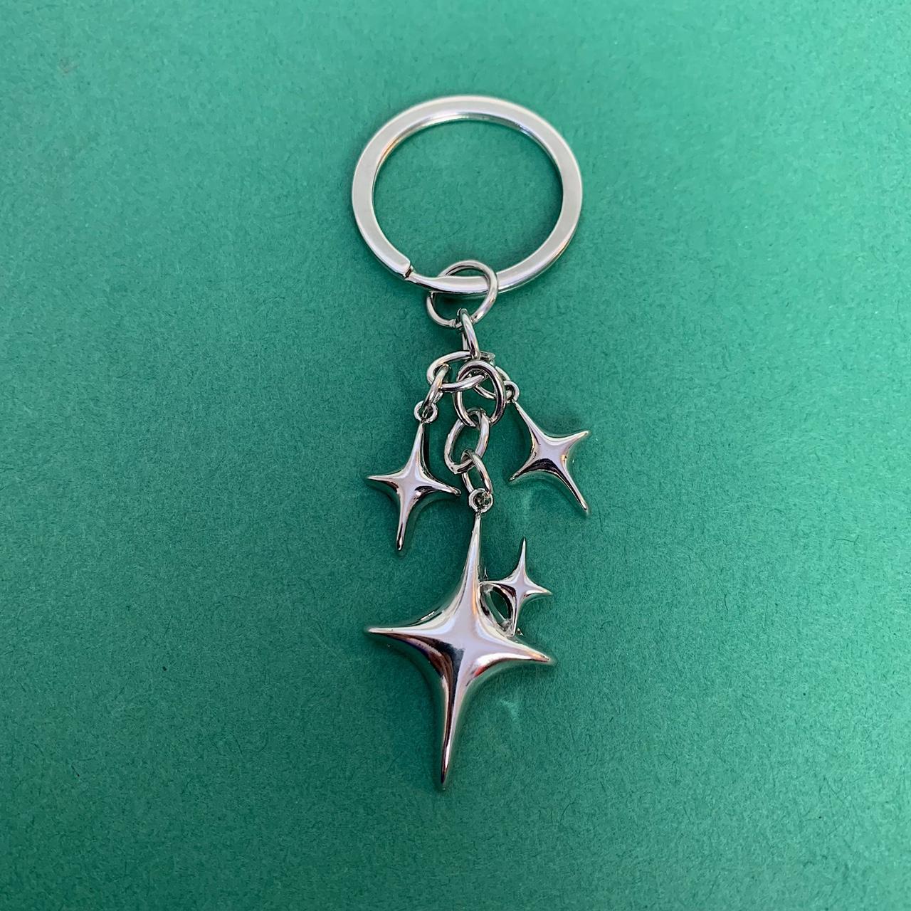 Y2k 2000s silver star pendant keyring for keychain.... - Depop