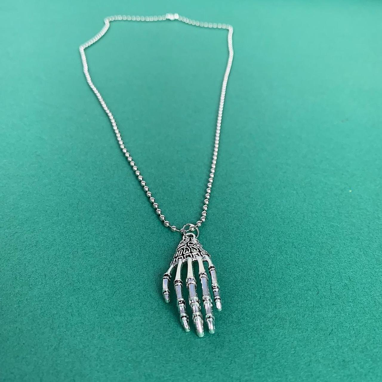 Skeleton hand y2k style punk goth necklace. 24 total... - Depop