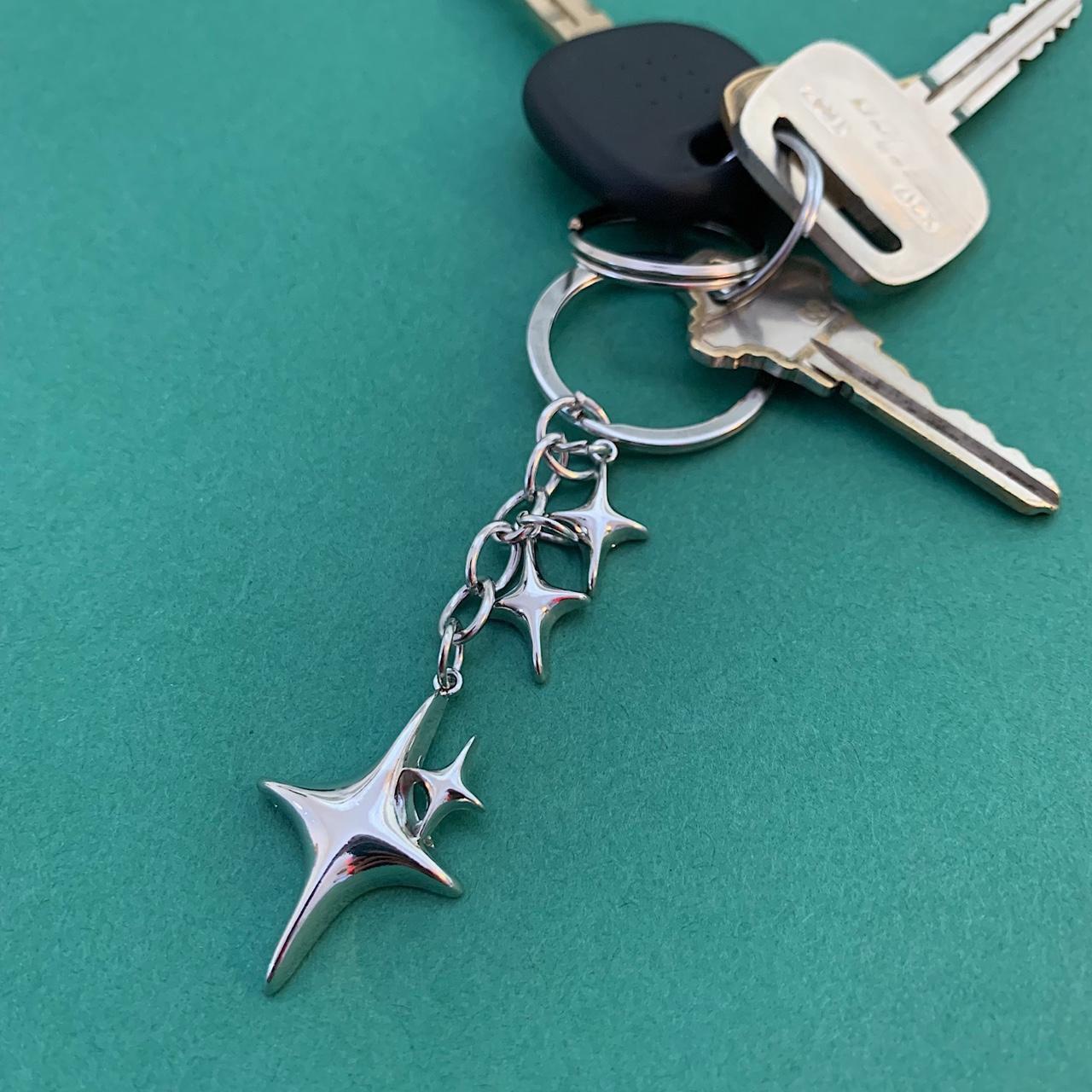 Y2k 2000s silver star pendant keyring for keychain.... - Depop