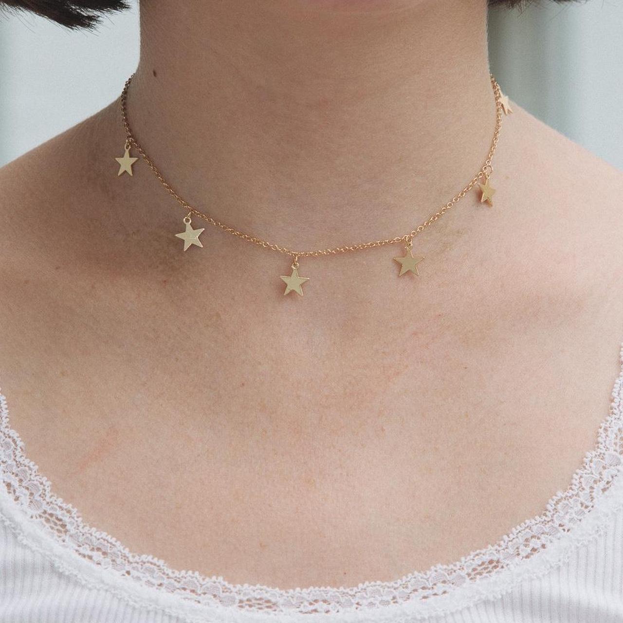Brandy Melville Gold star choker necklace . Depop